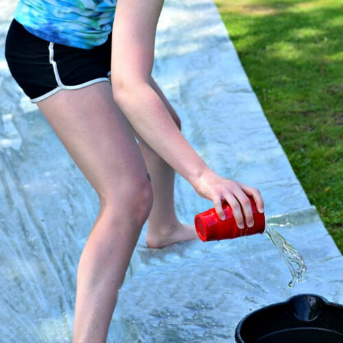 Pass the Water Game {Fun Summer Relay Race!} - Kid Friendly Things to Do